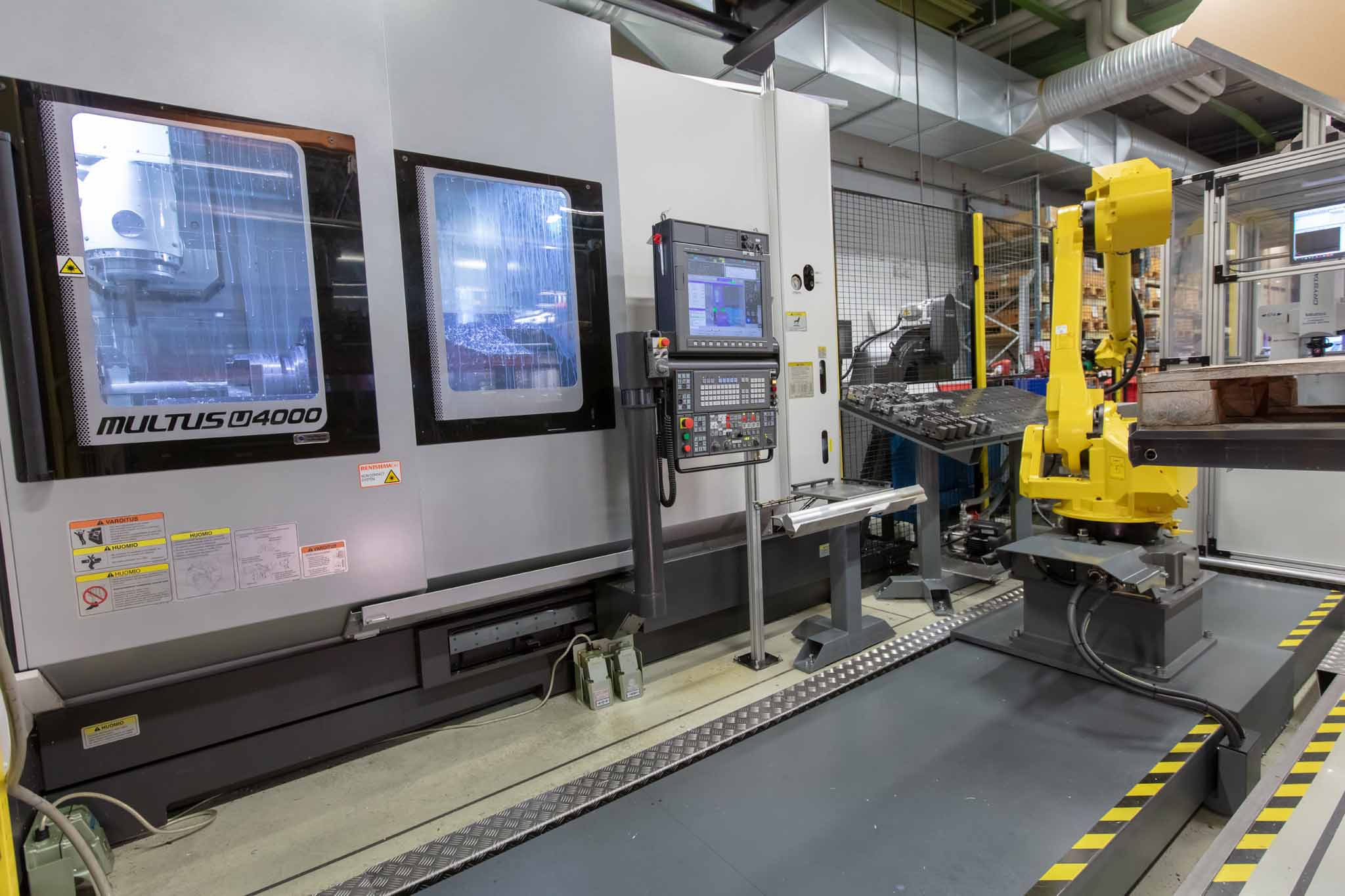 Pallet and robot based CNC automation for Okuma machine tools